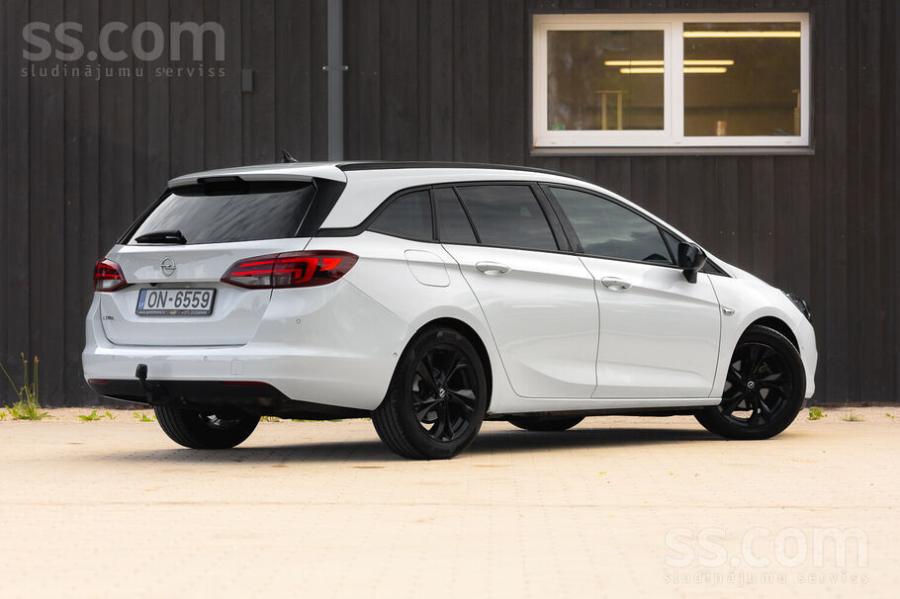 White Opel Astra 2021 in Jelgava, with an engine capacity of 1.40 L and mileage of 156 thousand km for 10900 €, photo 6 on AUTOMOTO.COM.LV