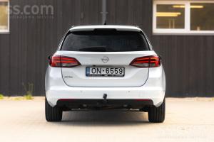White Opel Astra 2021 in Jelgava, with an engine capacity of 1.40 L and mileage of 156 thousand km for 10900 €, photo 7 on AUTOMOTO.COM.LV