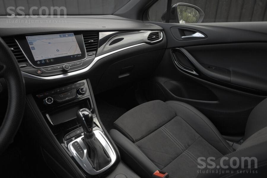 White Opel Astra 2021 in Jelgava, with an engine capacity of 1.40 L and mileage of 156 thousand km for 10900 €, photo 12 on AUTOMOTO.COM.LV