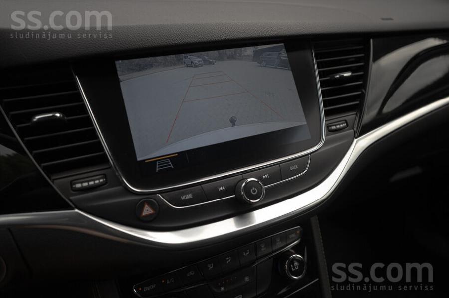 White Opel Astra 2021 in Jelgava, with an engine capacity of 1.40 L and mileage of 156 thousand km for 10900 €, photo 15 on AUTOMOTO.COM.LV