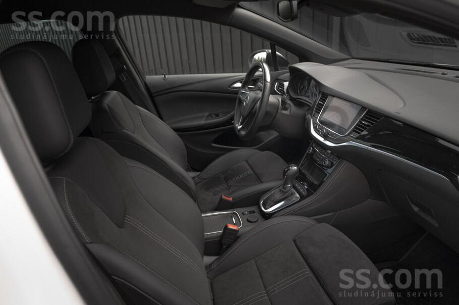 White Opel Astra 2021 in Jelgava, with an engine capacity of 1.40 L and mileage of 156 thousand km for 10900 €, photo 18 on AUTOMOTO.COM.LV