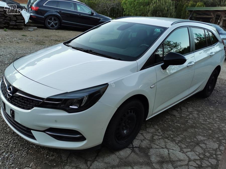 White Opel Astra 2021 in Kaunas, with an engine capacity of 1.50 L and mileage of 145 thousand km for 3900 €, photo 1 on AUTOMOTO.COM.LV