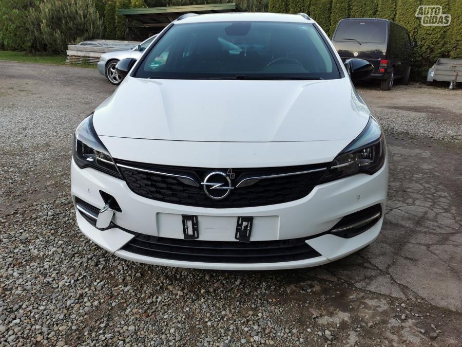 White Opel Astra 2021 in Kaunas, with an engine capacity of 1.50 L and mileage of 145 thousand km for 3900 €, photo 4 on AUTOMOTO.COM.LV
