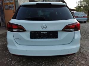 White Opel Astra 2021 in Kaunas, with an engine capacity of 1.50 L and mileage of 145 thousand km for 3900 €, photo 5 on AUTOMOTO.COM.LV