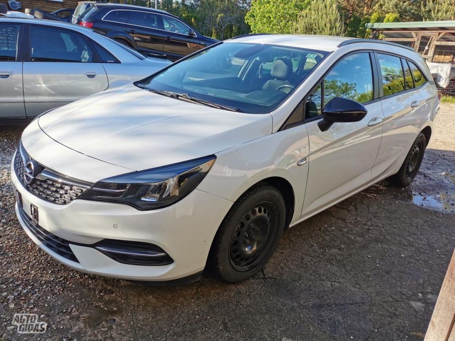 White Opel Astra 2021 in Kaunas, with an engine capacity of 1.50 L and mileage of 145 thousand km for 3900 €, photo 8 on AUTOMOTO.COM.LV