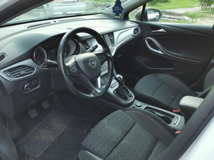 White Opel Astra 2021 in Kaunas, with an engine capacity of 1.50 L and mileage of 145 thousand km for 3900 €, photo 9 on AUTOMOTO.COM.LV