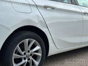 White Opel Astra 2021 in Riga, with an engine capacity of 1.60 L and mileage of 181 thousand km for 6950 €, photo 6 on AUTOMOTO.COM.LV