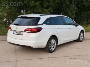White Opel Astra 2021 in Riga, with an engine capacity of 1.60 L and mileage of 181 thousand km for 6950 €, photo 7 on AUTOMOTO.COM.LV