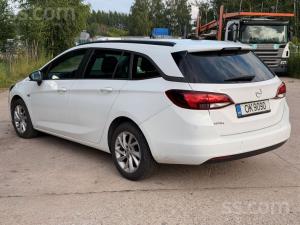White Opel Astra 2021 in Riga, with an engine capacity of 1.60 L and mileage of 181 thousand km for 6950 €, photo 8 on AUTOMOTO.COM.LV