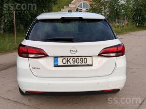 White Opel Astra 2021 in Riga, with an engine capacity of 1.60 L and mileage of 181 thousand km for 6950 €, photo 9 on AUTOMOTO.COM.LV