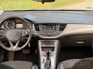 White Opel Astra 2021 in Riga, with an engine capacity of 1.60 L and mileage of 181 thousand km for 6950 €, photo 11 on AUTOMOTO.COM.LV