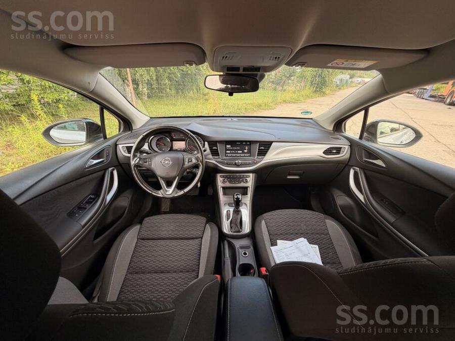 White Opel Astra 2021 in Riga, with an engine capacity of 1.60 L and mileage of 181 thousand km for 6950 €, photo 12 on AUTOMOTO.COM.LV