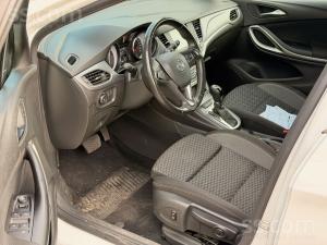 White Opel Astra 2021 in Riga, with an engine capacity of 1.60 L and mileage of 181 thousand km for 6950 €, photo 13 on AUTOMOTO.COM.LV