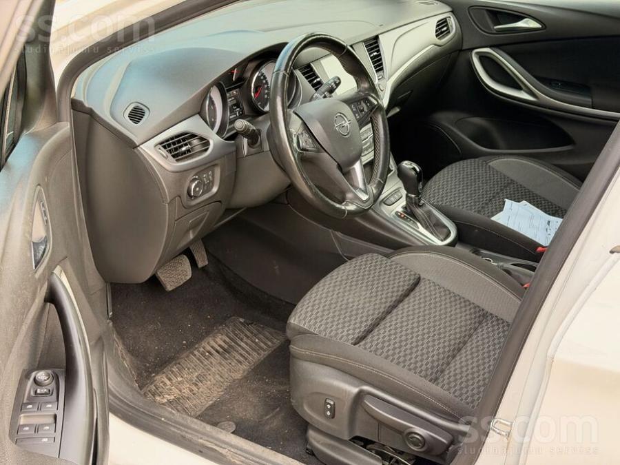 White Opel Astra 2021 in Riga, with an engine capacity of 1.60 L and mileage of 181 thousand km for 6950 €, photo 13 on AUTOMOTO.COM.LV