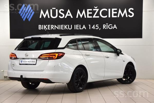 White Opel Astra 2021 in Riga, with an engine capacity of 1.20 L and mileage of 73 thousand km for 11390 €, photo 6 on AUTOMOTO.COM.LV