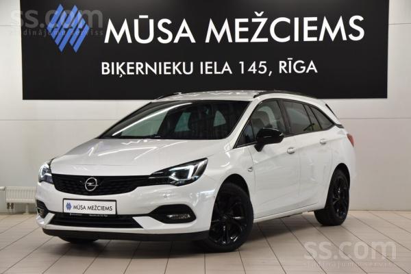 White Opel Astra 2021 in Riga, with an engine capacity of 1.20 L and mileage of 73 thousand km for 11390 €, photo 1 on AUTOMOTO.COM.LV