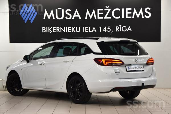 White Opel Astra 2021 in Riga, with an engine capacity of 1.20 L and mileage of 73 thousand km for 11390 €, photo 8 on AUTOMOTO.COM.LV