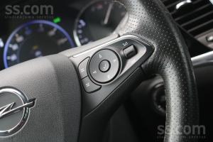 White Opel Astra 2021 in Tukums, with an engine capacity of 1.50 L and mileage of 144 thousand km for 9450 €, photo 19 on AUTOMOTO.COM.LV
