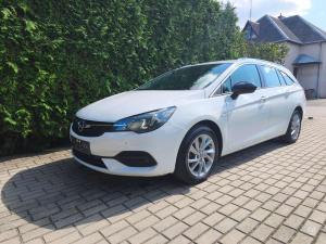 White Opel Astra 2022 in Kalvarija, with an engine capacity of 1.34 L and mileage of 101 thousand km for 11556 €, photo  on AUTOMOTO.COM.LV