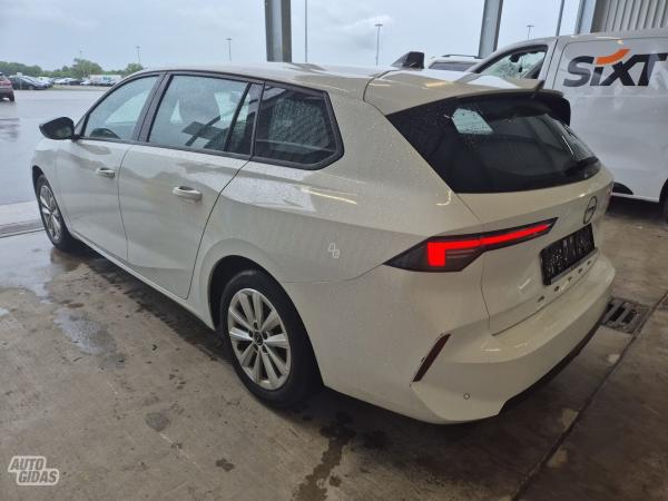 Белый Опель Астра 2023 в Вильнюс, объемом двигателя 1.50 л и пробегом 77 тыс. км за 11900 €, фото 2 на AUTOMOTO.COM.LV