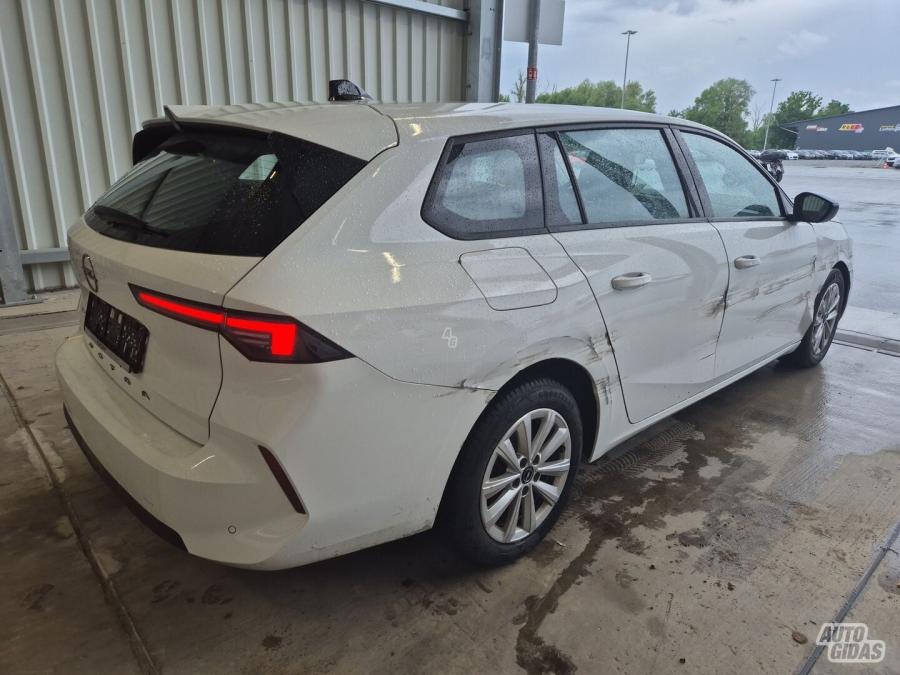 White Opel Astra 2023 in Vilnius, with an engine capacity of 1.50 L and mileage of 77 thousand km for 11900 €, photo 4 on AUTOMOTO.COM.LV