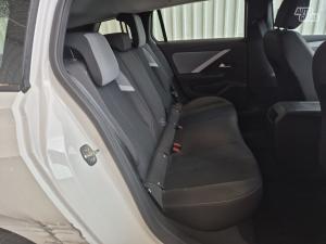 White Opel Astra 2023 in Vilnius, with an engine capacity of 1.50 L and mileage of 77 thousand km for 11900 €, photo 7 on AUTOMOTO.COM.LV