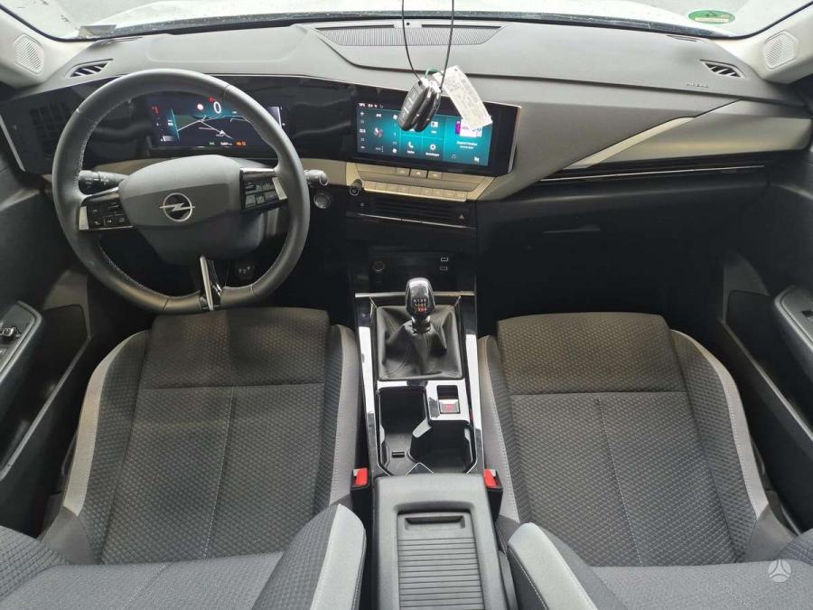 White Opel Astra 2023 in Vilnius, with an engine capacity of 1.50 L and mileage of 77 thousand km for 11900 €, photo 6 on AUTOMOTO.COM.LV