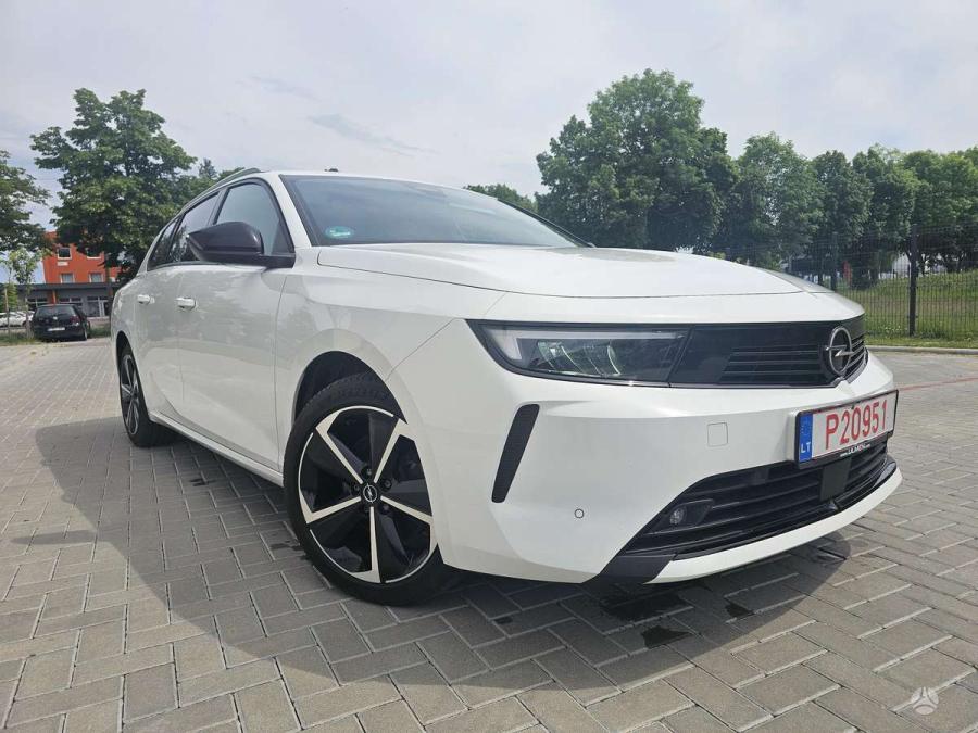 White Opel Astra 2023 in Kaunas, with an engine capacity of 1.50 L and mileage of 131 thousand km for 14999 €, photo 26 on AUTOMOTO.COM.LV