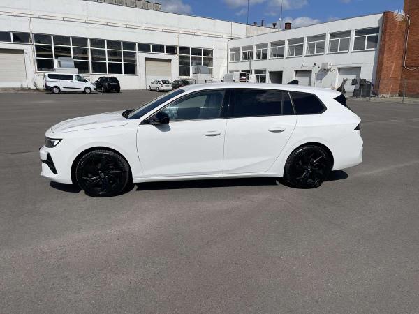 White Opel Astra 2023 in Marijampole, with an engine capacity of 1.50 L and mileage of 118 thousand km for 16400 €, photo 4 on AUTOMOTO.COM.LV
