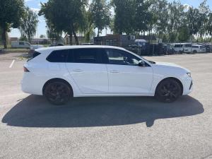 White Opel Astra 2023 in Marijampole, with an engine capacity of 1.50 L and mileage of 118 thousand km for 16400 €, photo 6 on AUTOMOTO.COM.LV