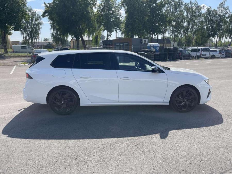 White Opel Astra 2023 in Marijampole, with an engine capacity of 1.50 L and mileage of 118 thousand km for 16400 €, photo 6 on AUTOMOTO.COM.LV