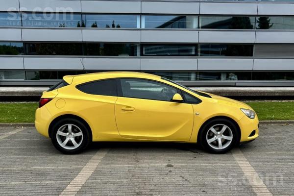 Yellow Opel Astra 2012 in Riga, with an engine capacity of 1.80 L and mileage of 182 thousand km for 4440 €, photo 6 on AUTOMOTO.COM.LV