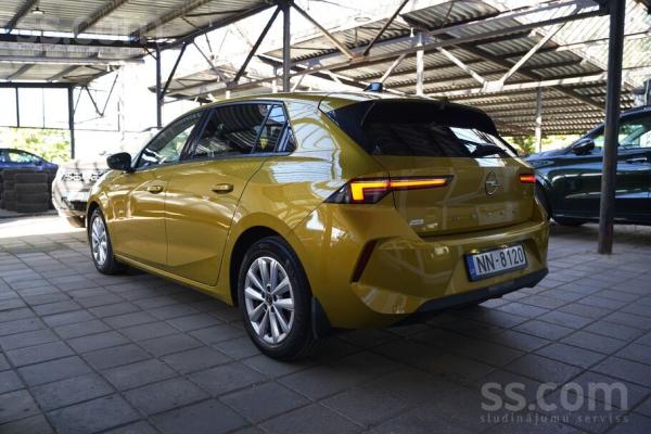 Yellow Opel Astra 2023 in Riga, with an engine capacity of 1.20 L and mileage of 61 thousand km for 12990 €, photo 5 on AUTOMOTO.COM.LV