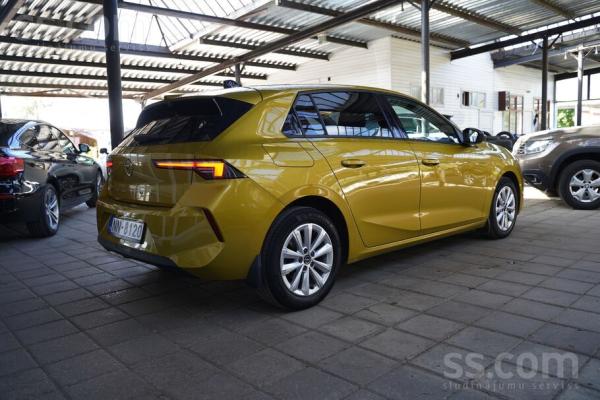 Yellow Opel Astra 2023 in Riga, with an engine capacity of 1.20 L and mileage of 61 thousand km for 12990 €, photo 6 on AUTOMOTO.COM.LV