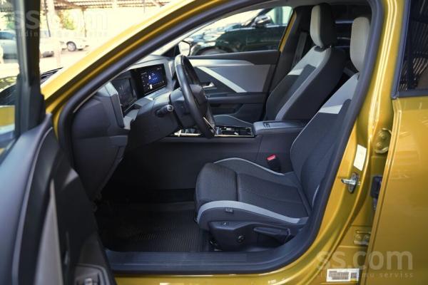 Yellow Opel Astra 2023 in Riga, with an engine capacity of 1.20 L and mileage of 61 thousand km for 12990 €, photo 9 on AUTOMOTO.COM.LV