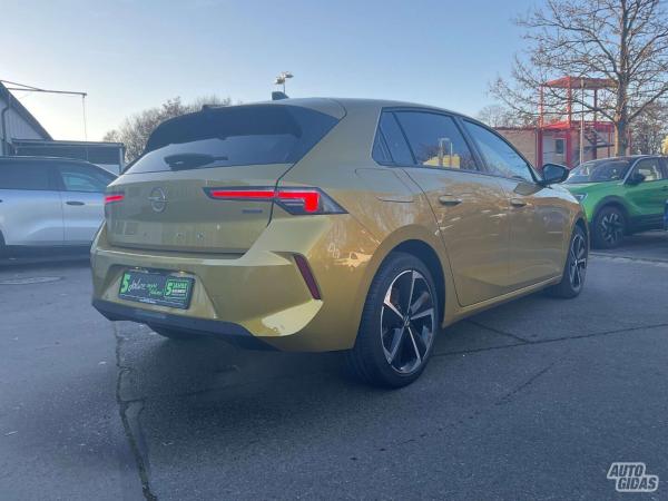 Yellow Opel Astra 2022 in Kaunas, with an engine capacity of 1.60 L and mileage of 25 thousand km for 23741 €, photo 4 on AUTOMOTO.COM.LV