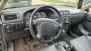 Green Opel Calibra 1998 in Daugavpils, with an engine capacity of 2.50 L and mileage of 286 thousand km for 2000 €, photo 4 on AUTOMOTO.COM.LV