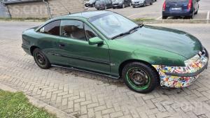 Green Opel Calibra 1998 in Daugavpils, with an engine capacity of 2.50 L and mileage of 286 thousand km for 2000 €, photo 6 on AUTOMOTO.COM.LV