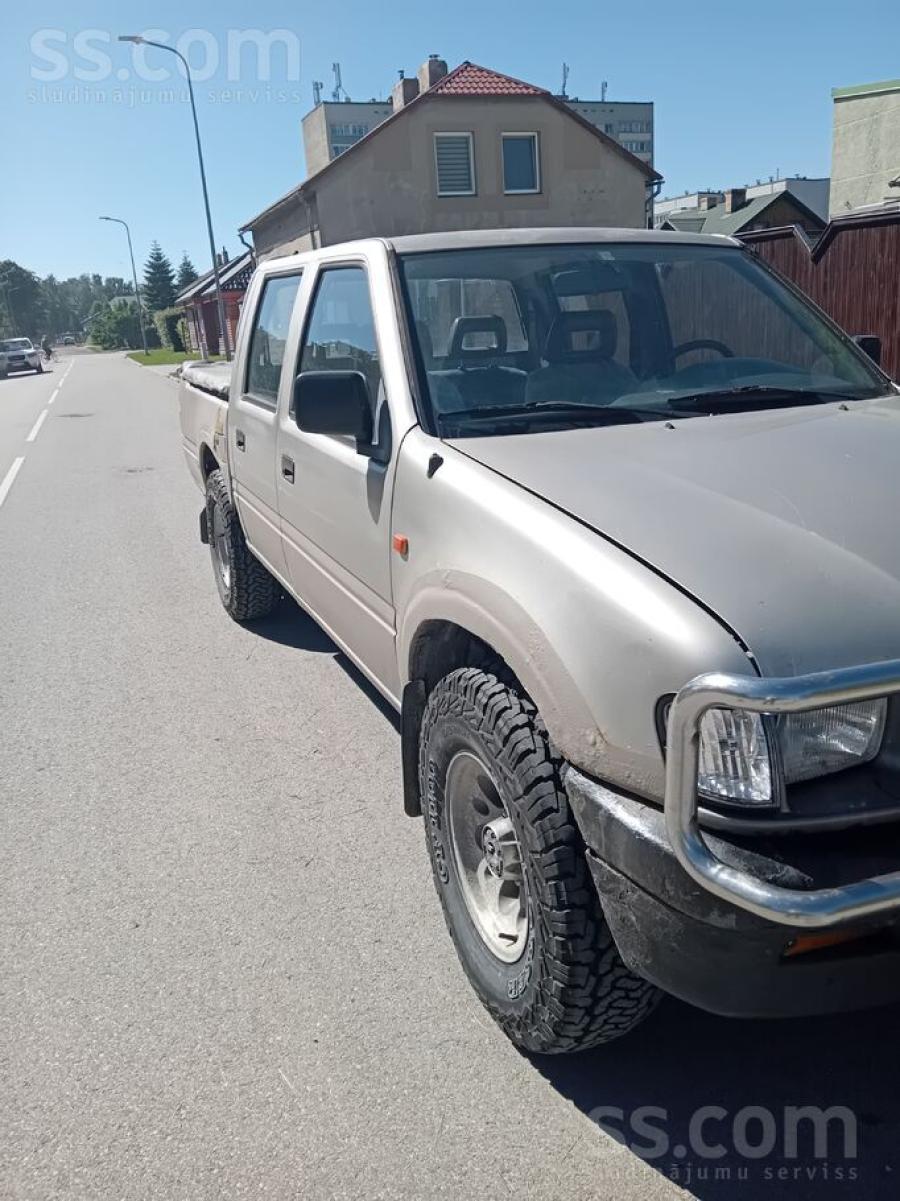 Pelēks Opel Campo 1998 Liepāja, ar dzinēja tilpumu 2.50 L un nobraukumu 326 tūkst. km par 990 €, foto 5 vietnē AUTOMOTO.COM.LV