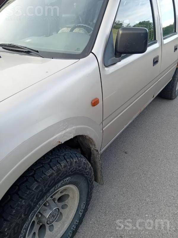 Pelēks Opel Campo 1998 Liepāja, ar dzinēja tilpumu 2.50 L un nobraukumu 326 tūkst. km par 990 €, foto 5 vietnē AUTOMOTO.COM.LV