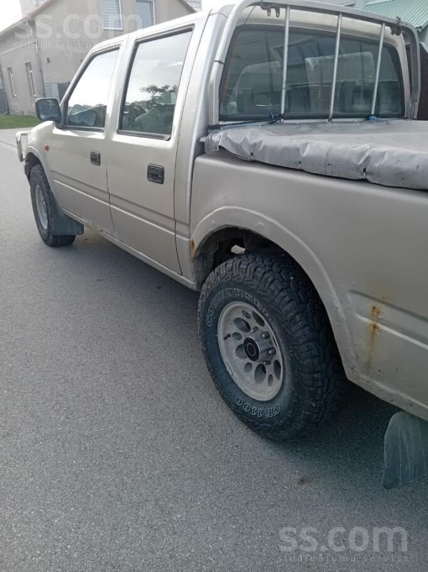 Pelēks Opel Campo 1998 Liepāja, ar dzinēja tilpumu 2.50 L un nobraukumu 326 tūkst. km par 990 €, foto 7 vietnē AUTOMOTO.COM.LV