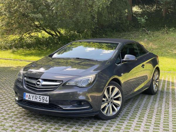Brown Opel Cascada 2013 in Vilnius, with an engine capacity of 1.96 L and mileage of 159 thousand km for 7400 €, photo 2 on AUTOMOTO.COM.LV