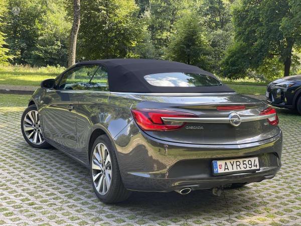 Brown Opel Cascada 2013 in Vilnius, with an engine capacity of 1.96 L and mileage of 159 thousand km for 7400 €, photo 6 on AUTOMOTO.COM.LV