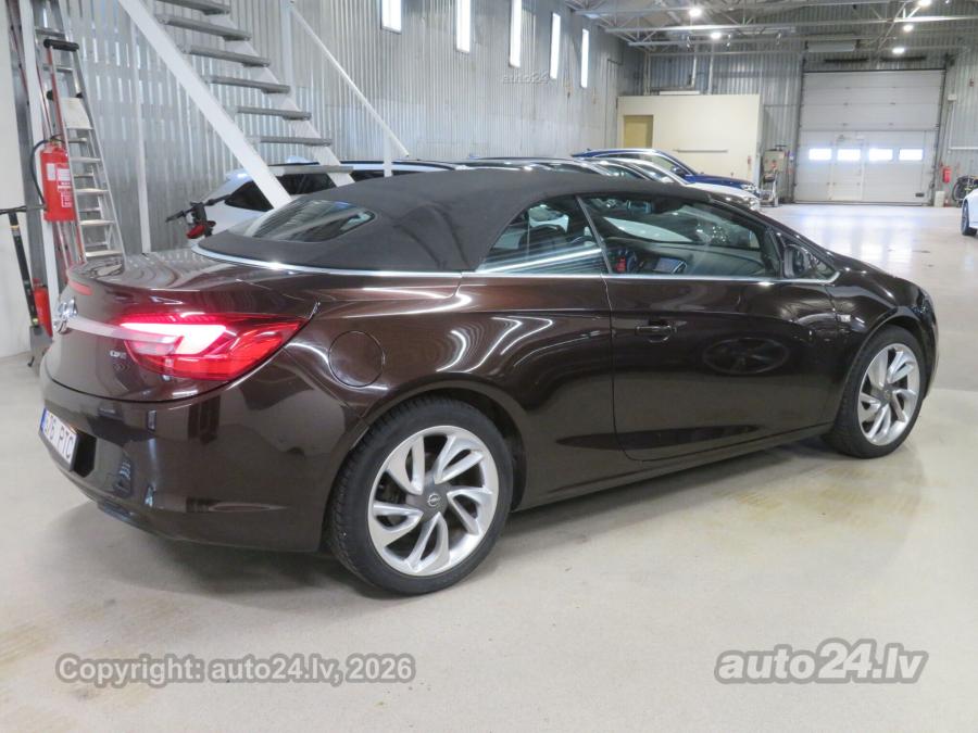 Brown Opel Cascada 2013 in Tallinn, with an engine capacity of 2.00 L and mileage of 196 thousand km for 7900 €, photo 5 on AUTOMOTO.COM.LV