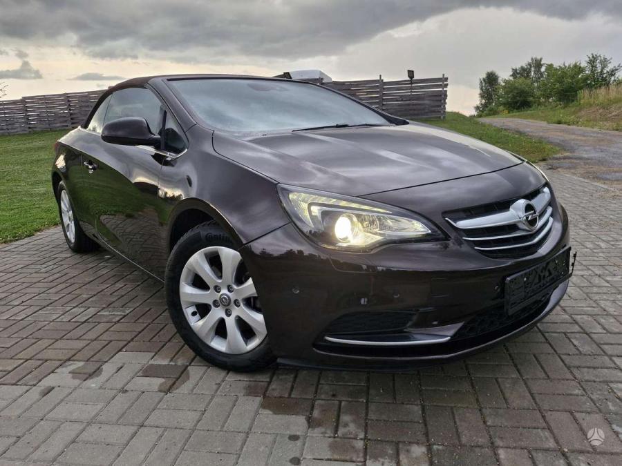 Brown Opel Cascada 2014 in Vilnius, with an engine capacity of 1.36 L and mileage of 144 thousand km for 6900 €, photo 7 on AUTOMOTO.COM.LV