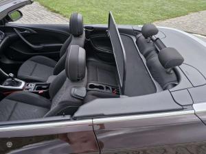Brown Opel Cascada 2014 in Vilnius, with an engine capacity of 1.36 L and mileage of 144 thousand km for 6900 €, photo 13 on AUTOMOTO.COM.LV