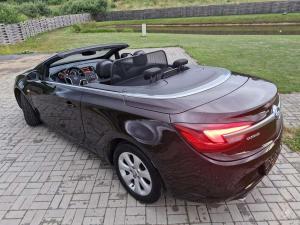 Brown Opel Cascada 2014 in Vilnius, with an engine capacity of 1.36 L and mileage of 145 thousand km for 5950 €, photo 9 on AUTOMOTO.COM.LV