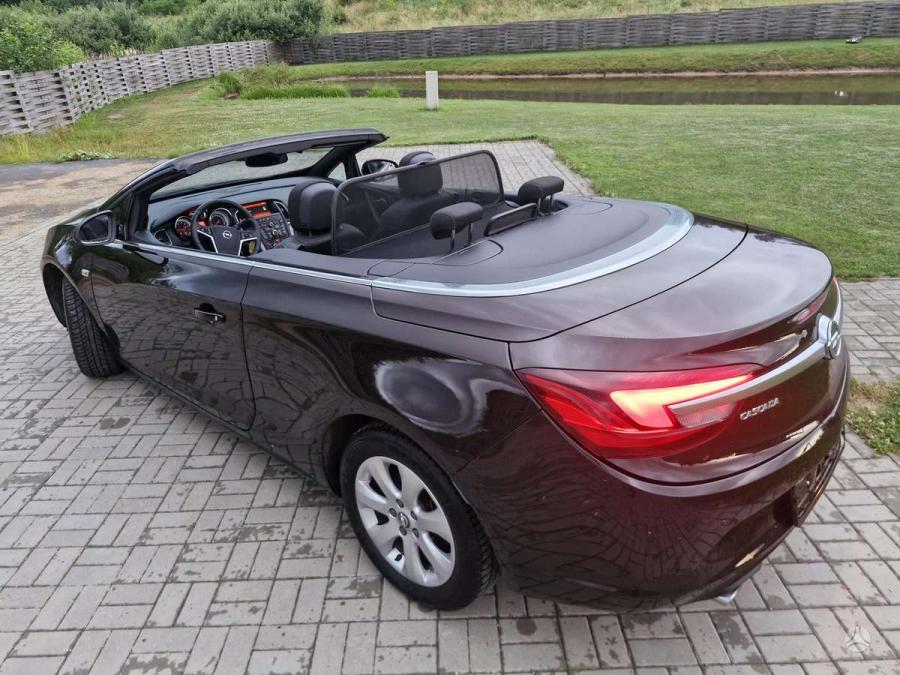 Brown Opel Cascada 2014 in Vilnius, with an engine capacity of 1.36 L and mileage of 145 thousand km for 5950 €, photo 9 on AUTOMOTO.COM.LV
