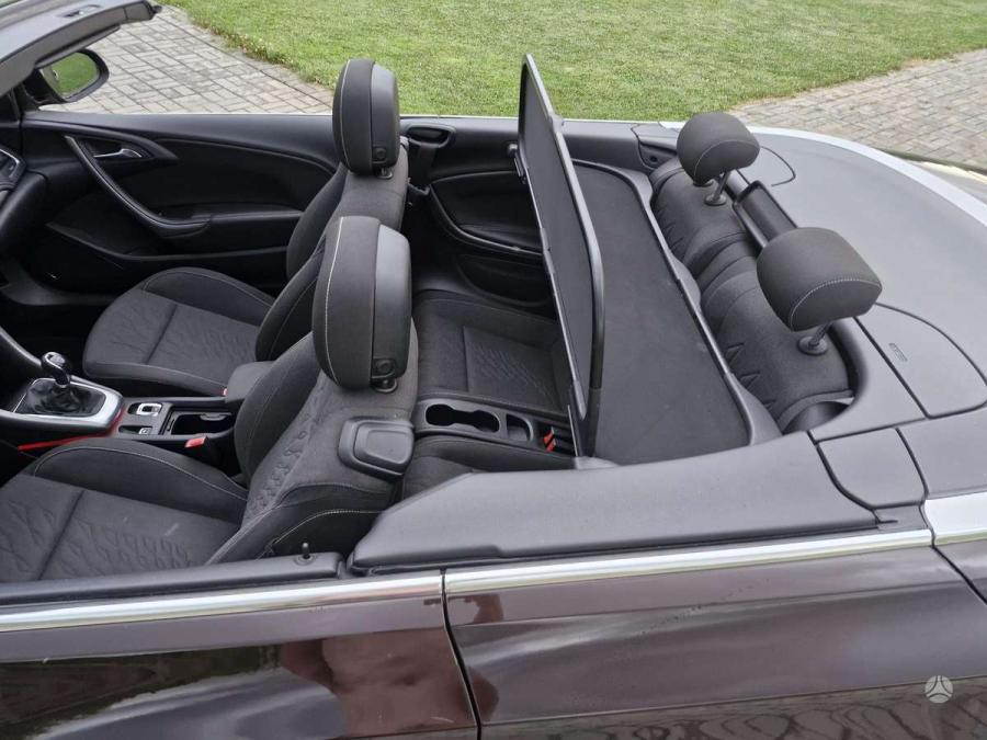 Brown Opel Cascada 2014 in Vilnius, with an engine capacity of 1.36 L and mileage of 145 thousand km for 5950 €, photo 12 on AUTOMOTO.COM.LV