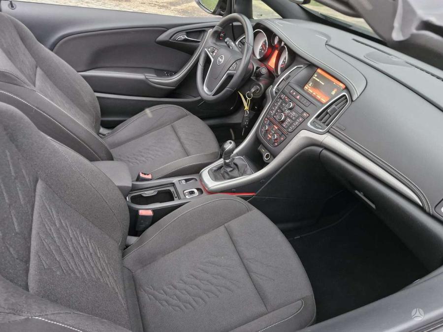 Brown Opel Cascada 2014 in Vilnius, with an engine capacity of 1.36 L and mileage of 145 thousand km for 5950 €, photo 14 on AUTOMOTO.COM.LV